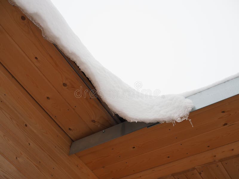 Snow is Hanging from the Roof of the House Stock Photo - Image of ...