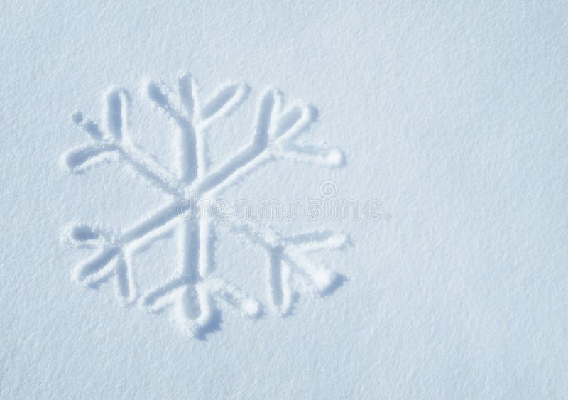 The Snow Has Started Falling. Shot of a Snowflake Symbol on a Snow ...