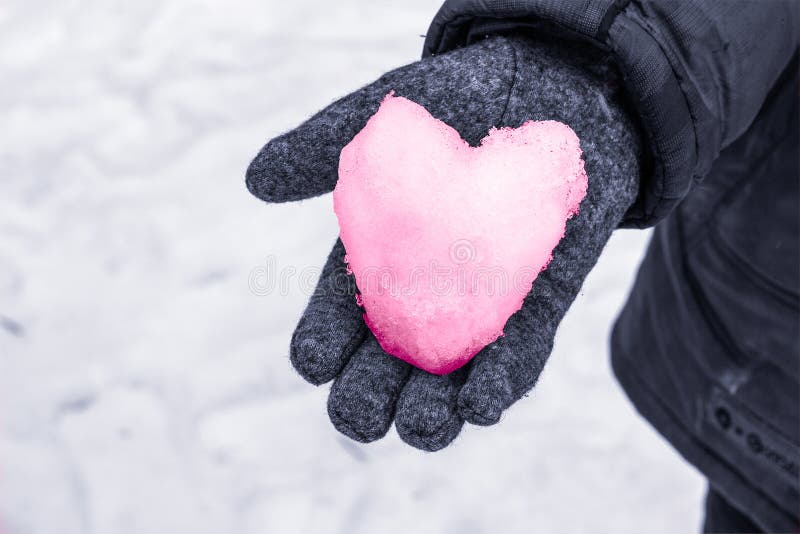 Snow heart in his hands. stock photo. Image of march - 35354994