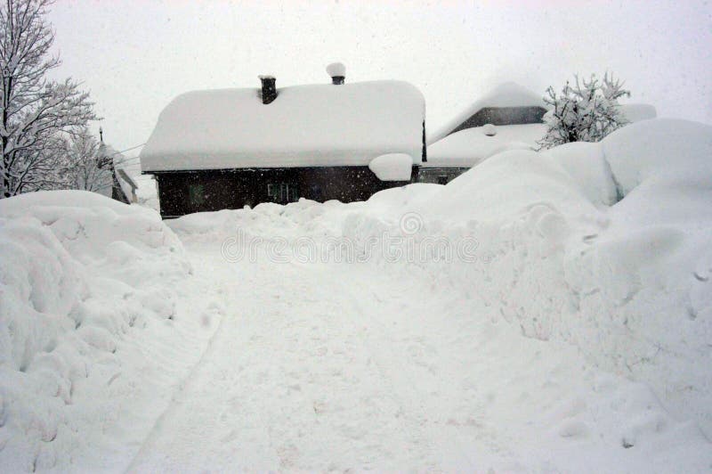 Snow on the house roof stock photo. Image of market - 187643780