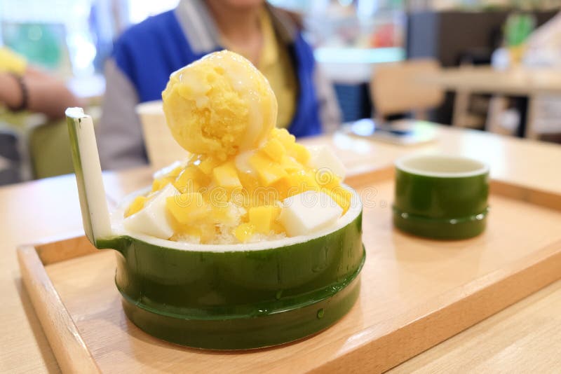 Snow Ice Flake Dessert Topping with Slice Mango Stock Image - Image of ...