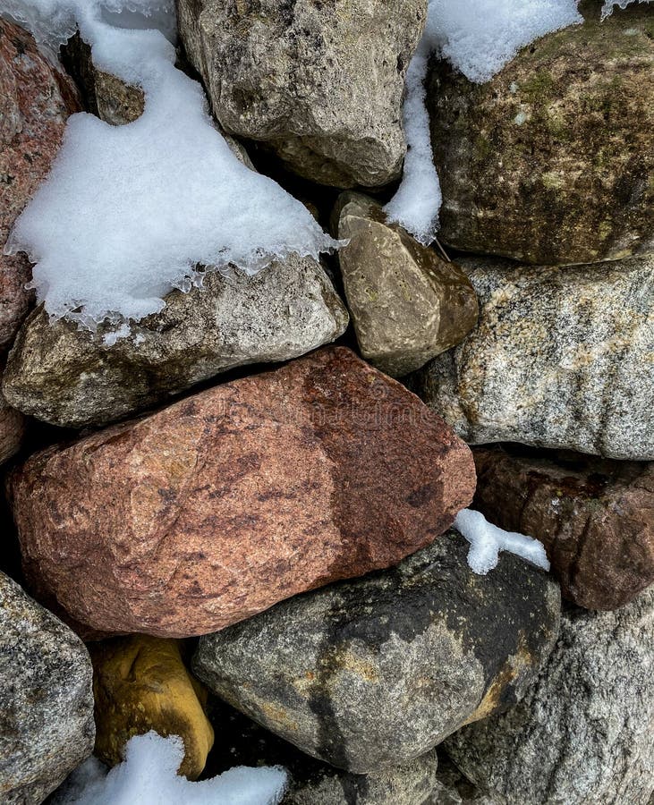 Snow and Ice Melting Over Textured Stone Wall Stock Image - Image of ...