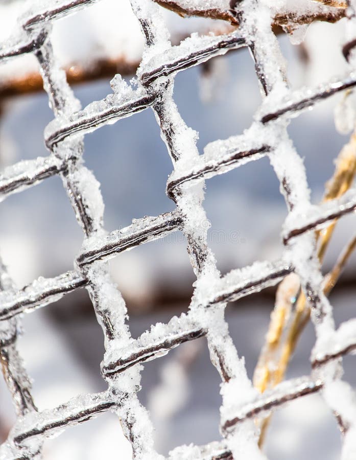 Snow and Ice on a Metal Grid As a Background Stock Image - Image of ...