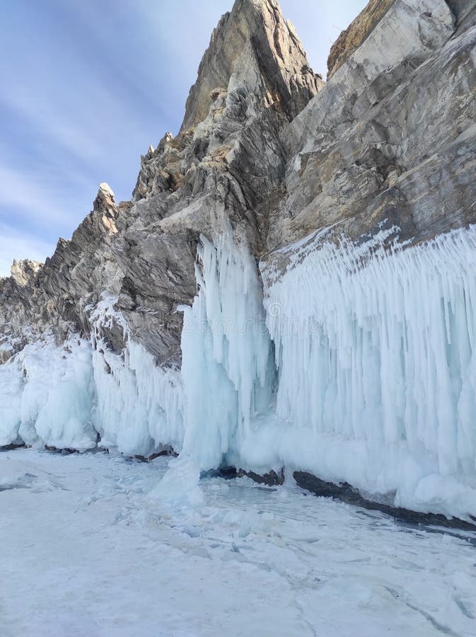 Snow Icicles and Winter Patterns on the Rocks in the Cave Stock Image ...