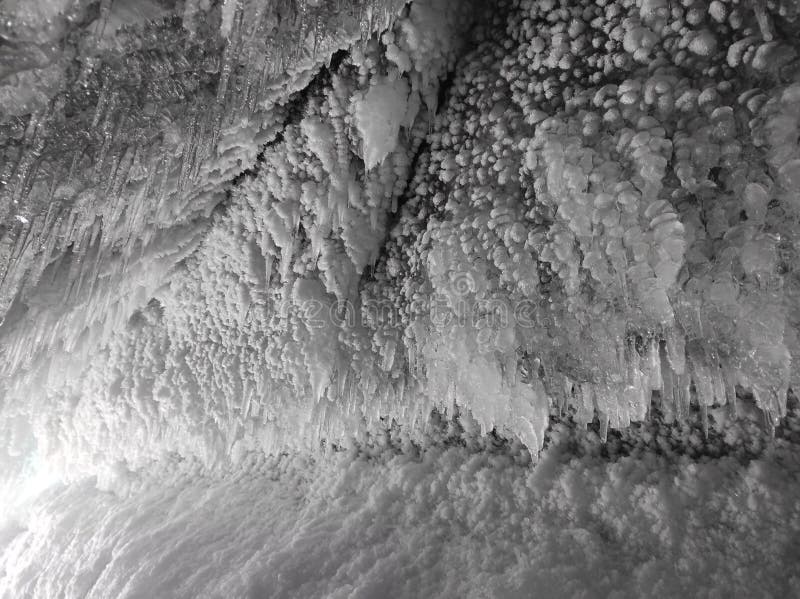 Snow Icicles and Winter Patterns on the Rocks in the Cave Stock Photo ...