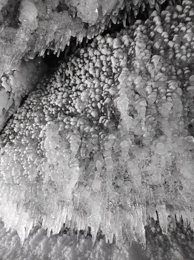 Snow Icicles and Winter Patterns on the Rocks in the Cave Stock Photo ...