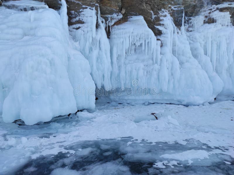 Snow Icicles and Winter Patterns on the Rocks in the Cave Stock Image ...