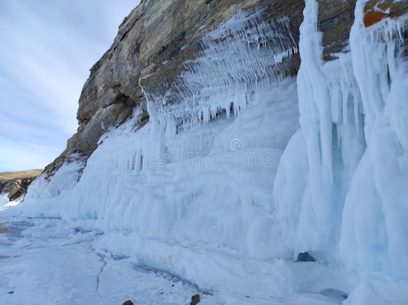 Snow Icicles and Winter Patterns on the Rocks in the Cave Stock Image ...