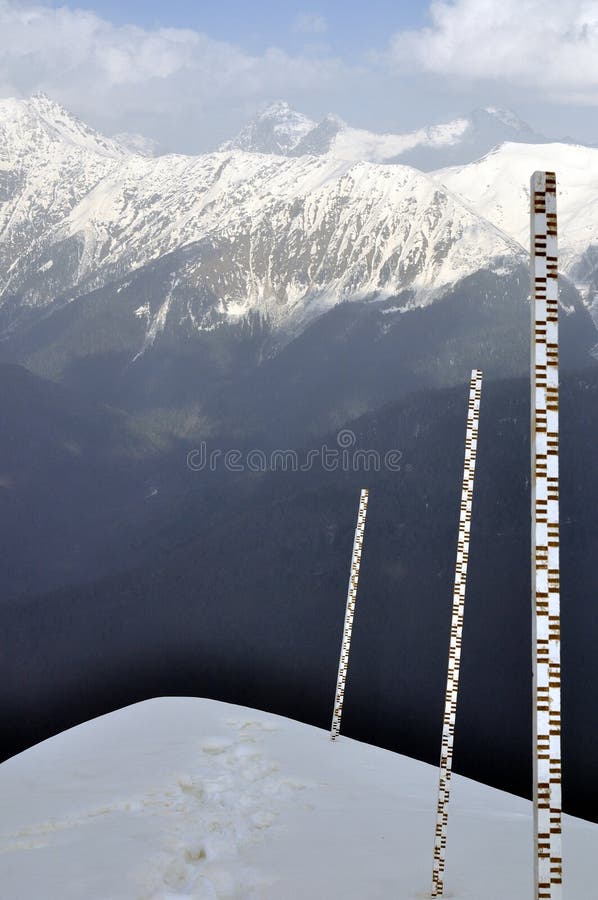 Snow Indicator Sticks on Mountain Edge Stock Photo - Image of nature ...