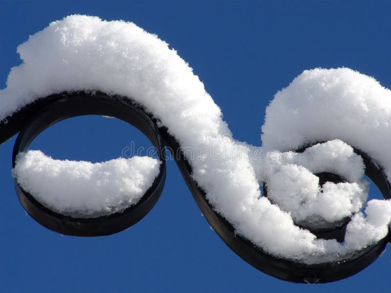 Snow on Iron stock image. Image of iron, light, curly - 4479475