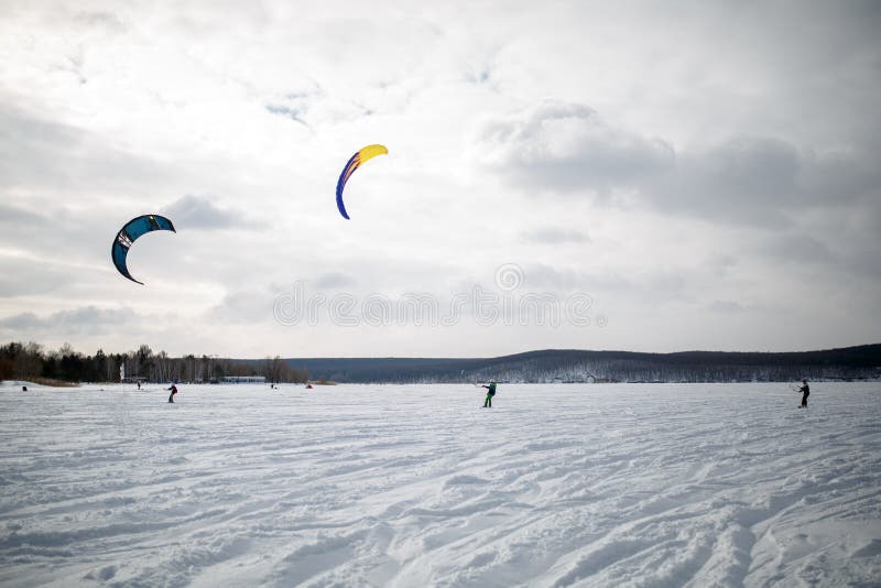 Snow Kiting on a Snowboard on a Frozen Lake Stock Image - Image of lake ...