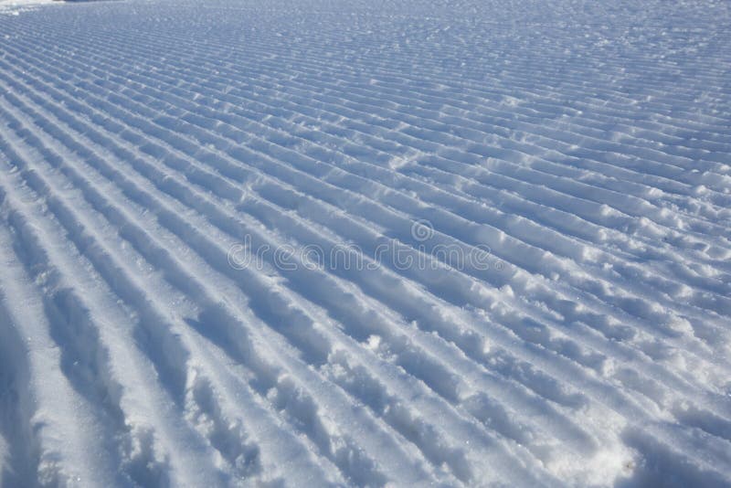 Snow Lines Made from a Snow Machine Stock Image - Image of slalom ...