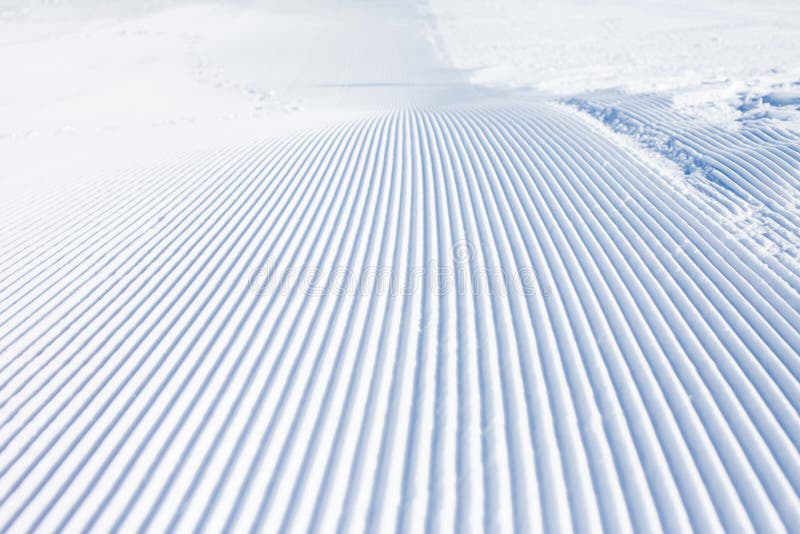 Snow Lines Made from a Snow Machine Stock Photo - Image of blue, groove ...