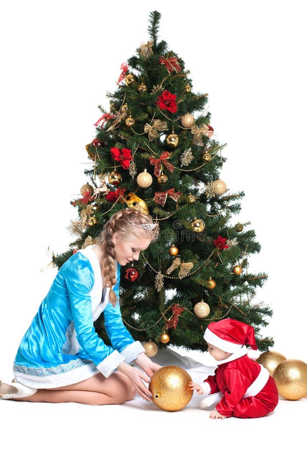 Snow Maiden and Baby-Santa with Christmas Tree Stock Photo - Image of ...