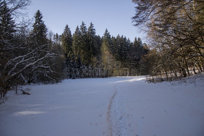 Snow meadow with road stock image. Image of beam, blue - 84751709