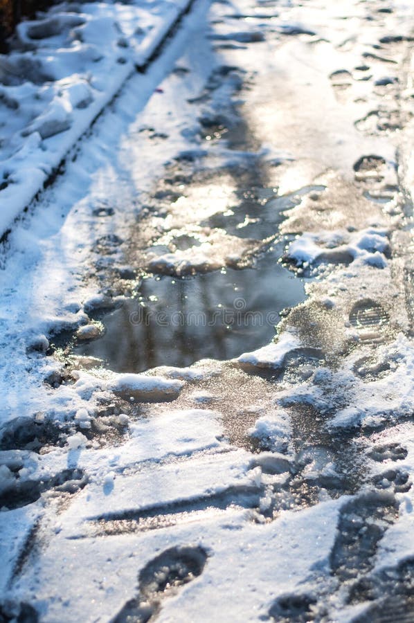 Snow Melting in Early Spring Stock Photo - Image of reflection, snow ...
