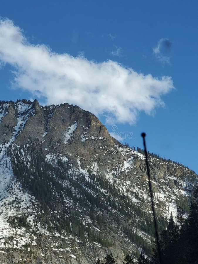 Snow melting on mountain stock photo. Image of terrain - 256000536