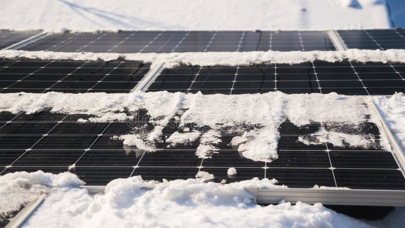 Snow Melts on Solar Panels with the Arrival of Spring Stock Image ...