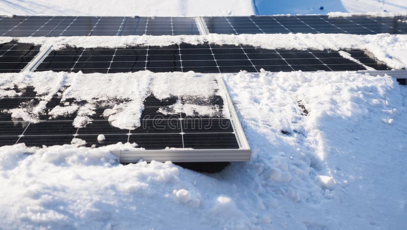 Snow Melts on Solar Panels with the Arrival of Spring Stock Image ...