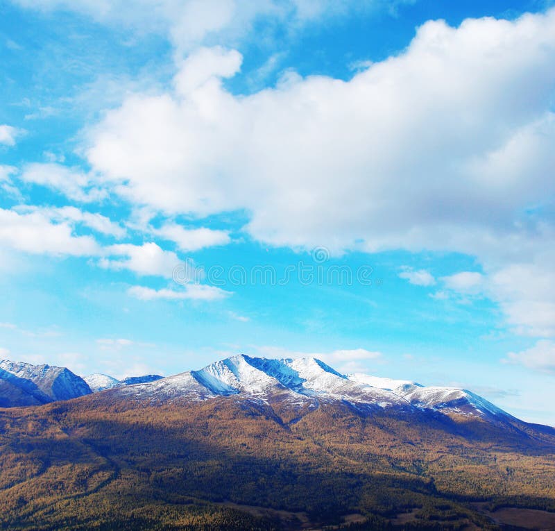 Snow Mountain with Blue Sky and White Clouds Stock Photo - Image of ...