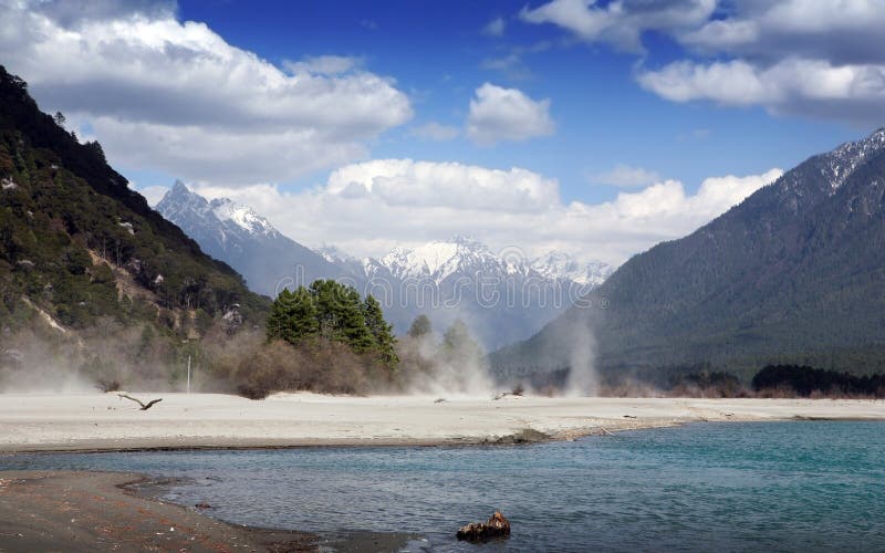 Snow mountain and river stock image. Image of serenity - 5173233