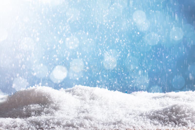 Snow Particles Falling Down Over a Blue Background Stock Photo - Image ...
