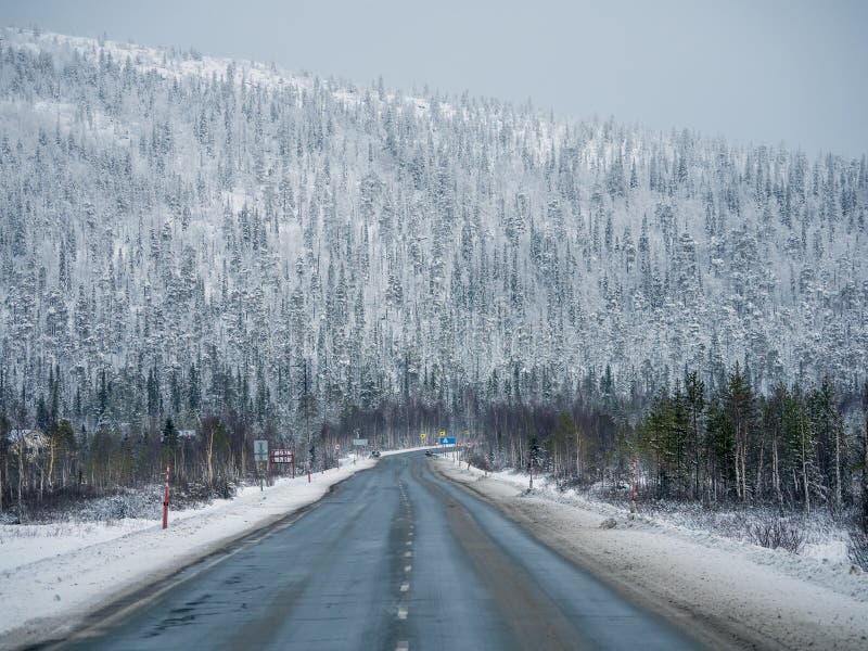 Arctic Ice Road Covered in Snow Leads To a Valley Stock Photo - Image ...