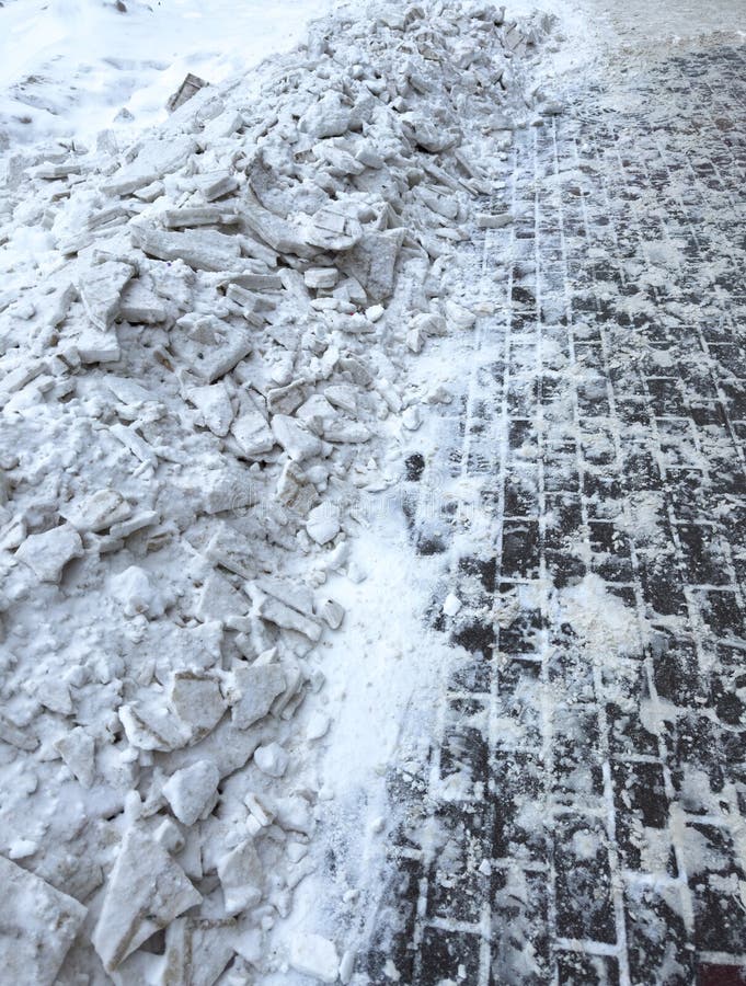 Snow on Paving Slabs in Winter Stock Photo - Image of snowy, volcano ...
