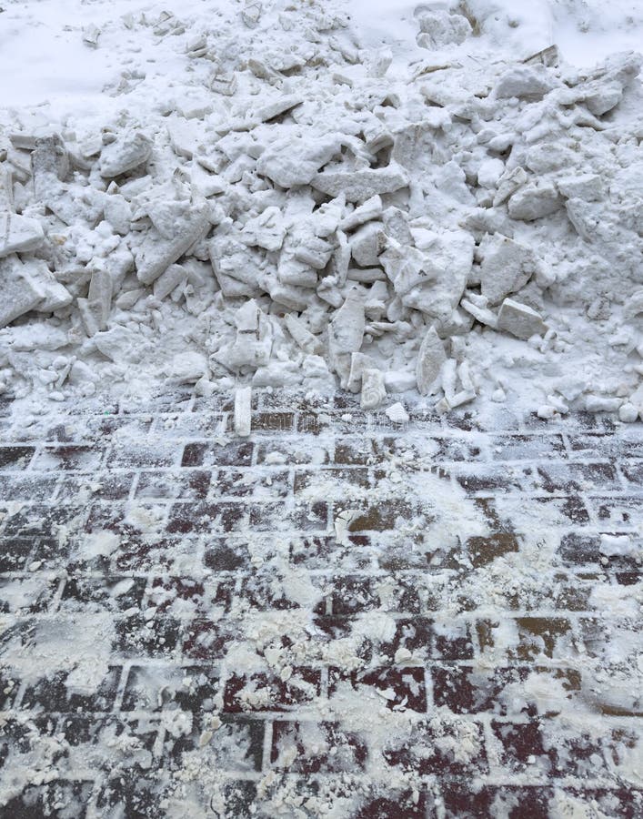 Snow on Paving Slabs in Winter Stock Photo - Image of clearing, frozen ...
