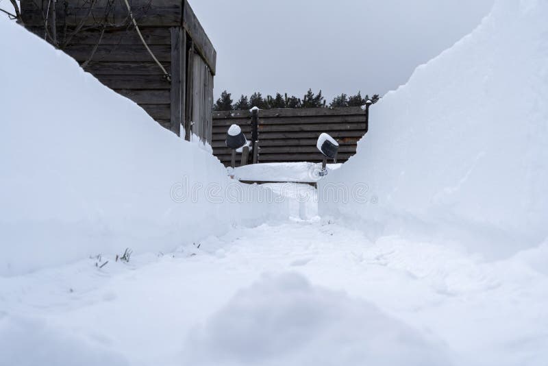 Snow Plow Track in High Snow Levels in Winter Stock Photo - Image of ...