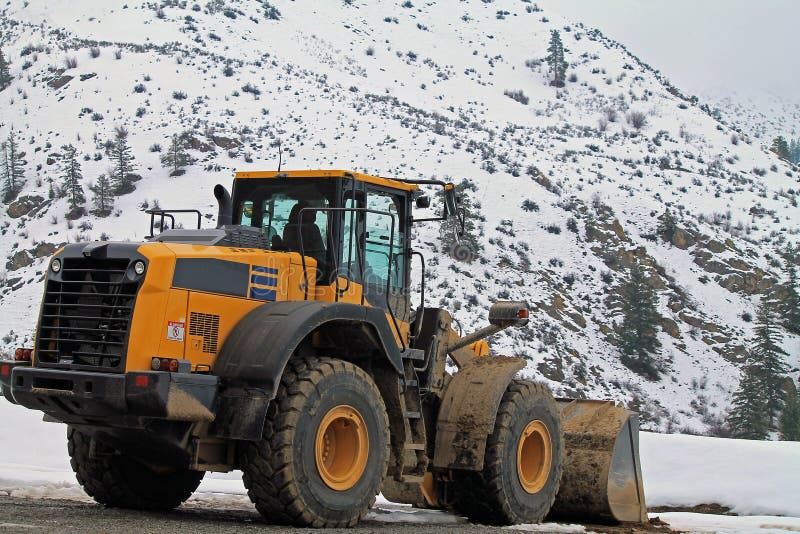 Snow Plow Waiting for the Next Storm Stock Image - Image of mountains ...