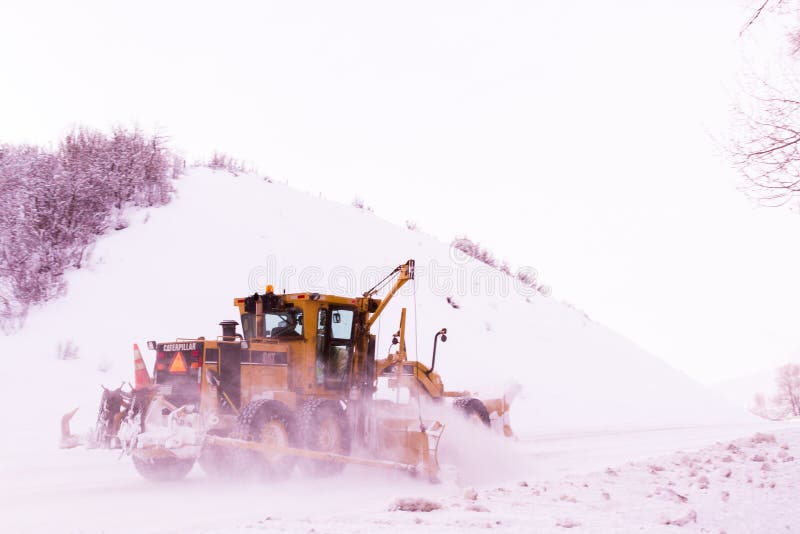 Snow plow editorial photography. Image of caterpillar - 284356447
