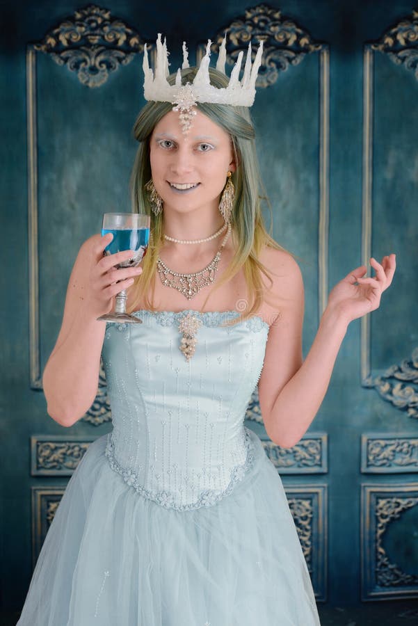 Snow Princess Holding a Drink Stock Photo - Image of female, lady: 77433288