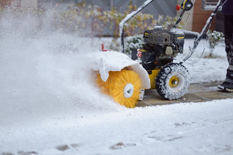 Snow Removal Machine, Man Uses Snow Blower To Clear Snow Stock Photo ...