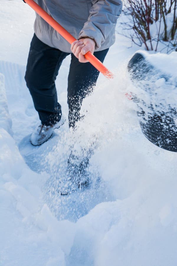 Man Clearing Snow by Shovel after Snowfall. Outdoors Stock Photo ...