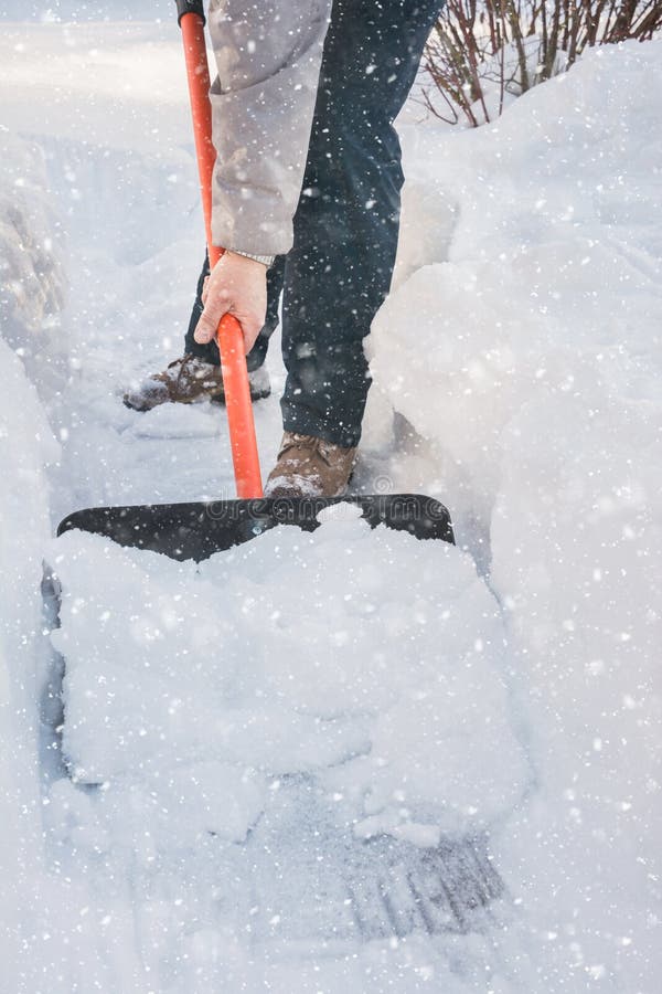 Man Clearing Snow by Shovel after Snowfall. Outdoors Stock Photo ...