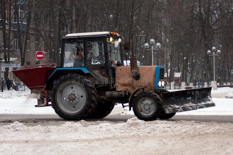 Snow-removal tractors. editorial image. Image of machine - 61572735