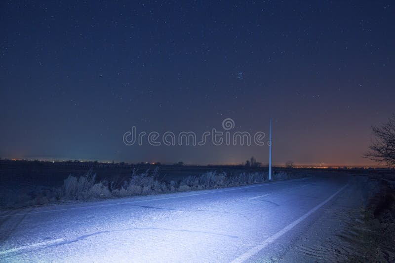 Snow in road at night stock image. Image of drive, winter - 166971169