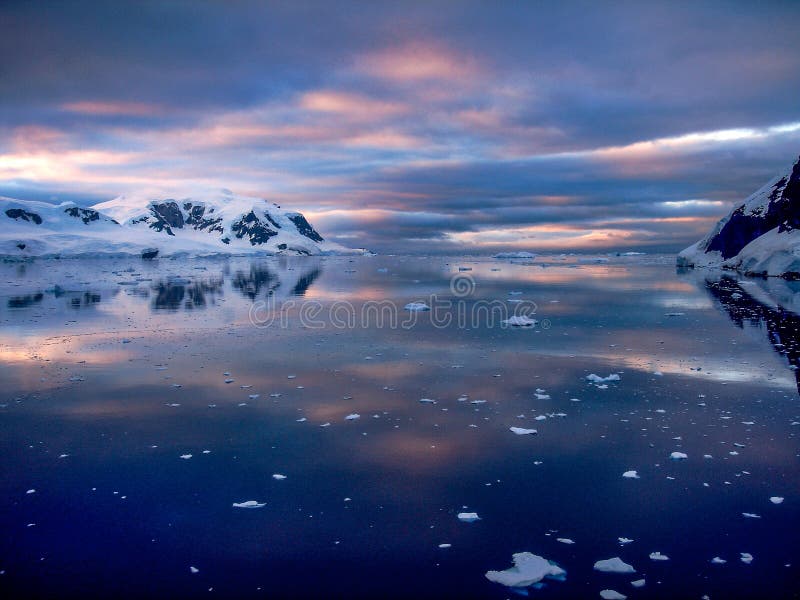 Snow, Rock and Ice Reflections on the Antarctic Peninsula Stock Photo ...