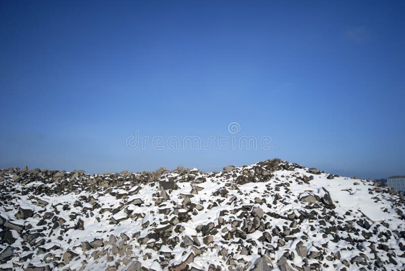 Snow on rocks stock photo. Image of blue, stone, hill - 12824262