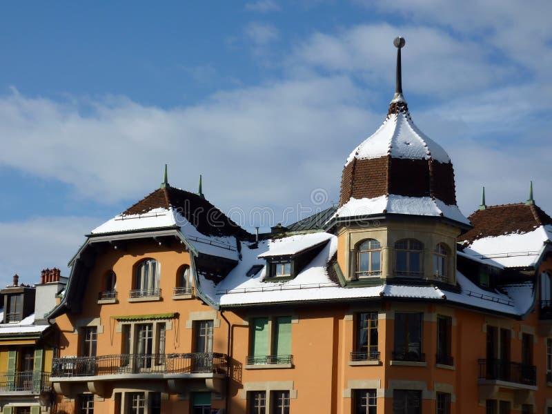 Snow on Roof of a Colored Building Stock Image - Image of rooftop ...