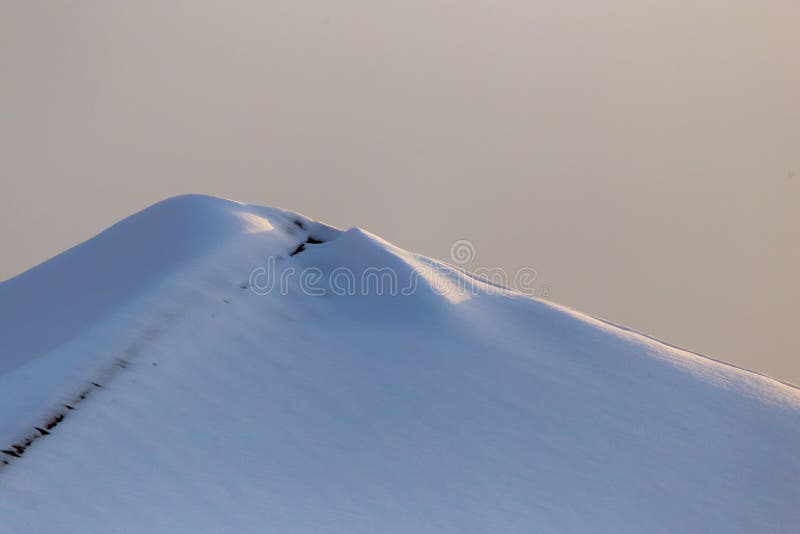Snow on the Roof of the House at Sunset Stock Photo - Image of scenic ...