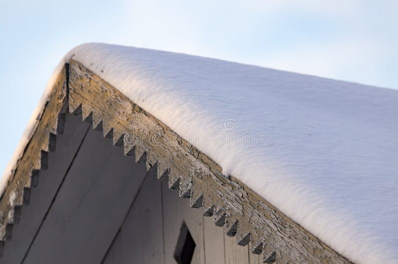 Snow on the Roof of the House at Sunset Stock Image - Image of sunset ...