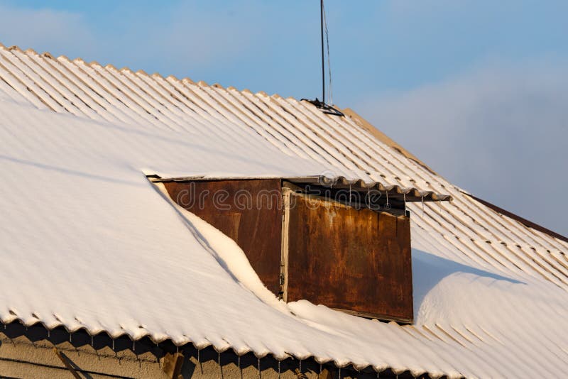 Snow on the Roof of the House at Sunset Stock Image - Image of ...