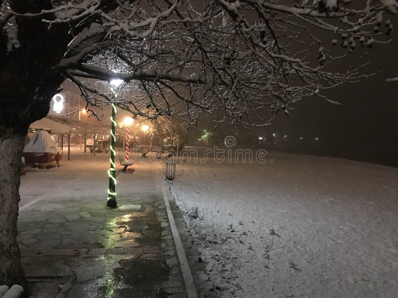 Snow by the sea at night stock photo. Image of darkness - 83744794