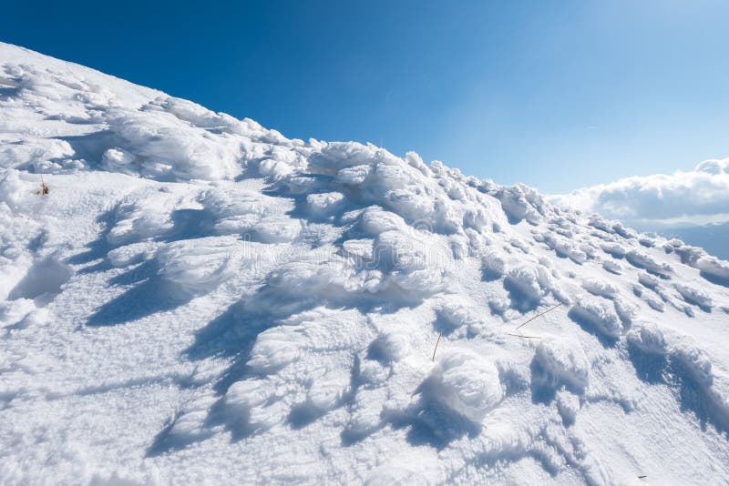 Snow shaped by the wind stock image. Image of detail - 271294967
