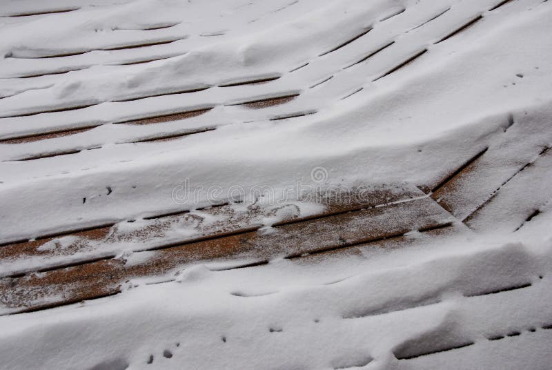 Snow Sifting through Cracks in Deck Stock Image - Image of deck, snow ...