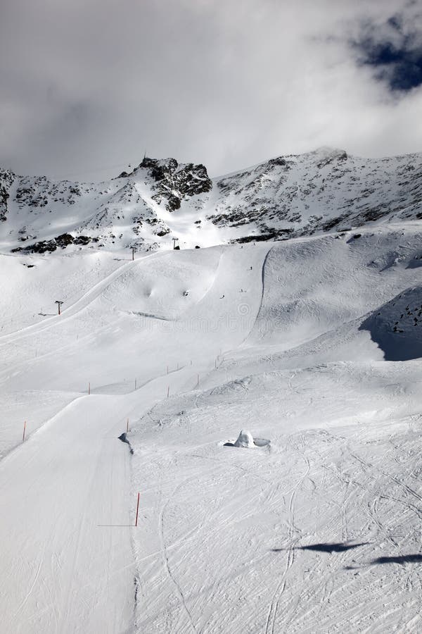 Alpine slopes landscape stock image. Image of clouds, resort - 5594613