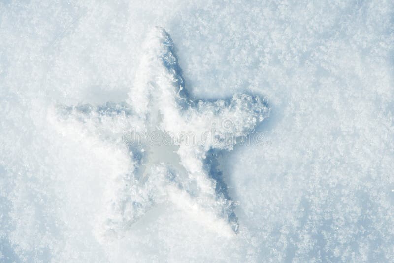 Snow star in the snow stock photo. Image of cold, star - 123927682