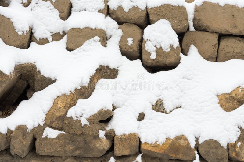 Snow stone wall stock photo. Image of snowy, brick, dirty - 42703366
